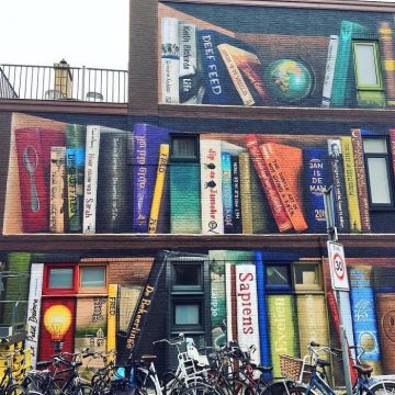 Street Art for Book Lovers: Dutch Artists Paint Massive Bookcase Mural ...