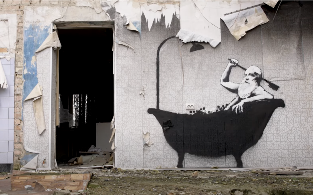 Banksy Spray Paints Murals in War-Torn Ukraine | Open Culture